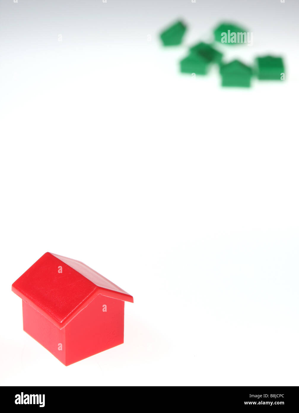 Monopoly houses shot against a white background Stock Photo - Alamy