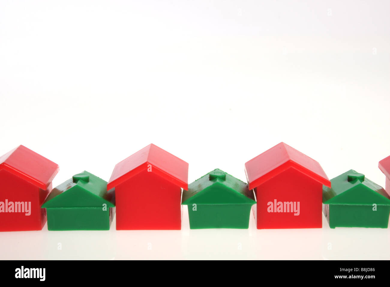 Row of Monopoly houses Stock Photo - Alamy