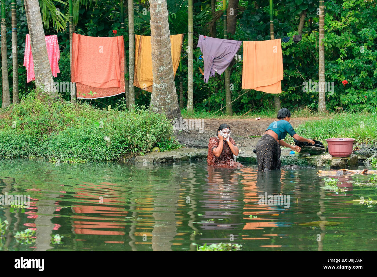 Kerala Women Bathing In Pond