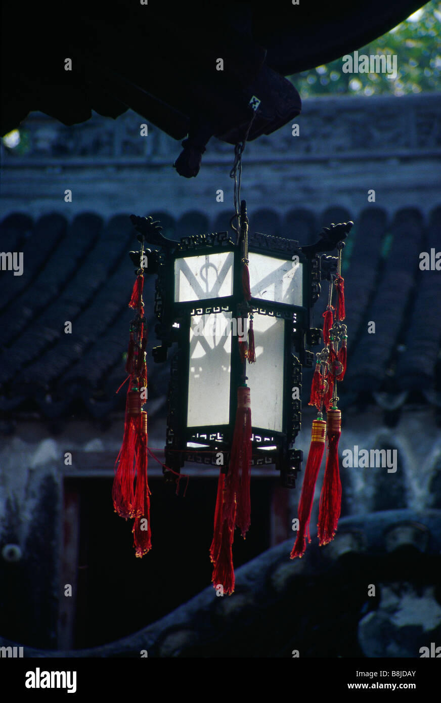 Traditional lantern hanging from roof Red tassles SHANGHAI CHINA Stock ...