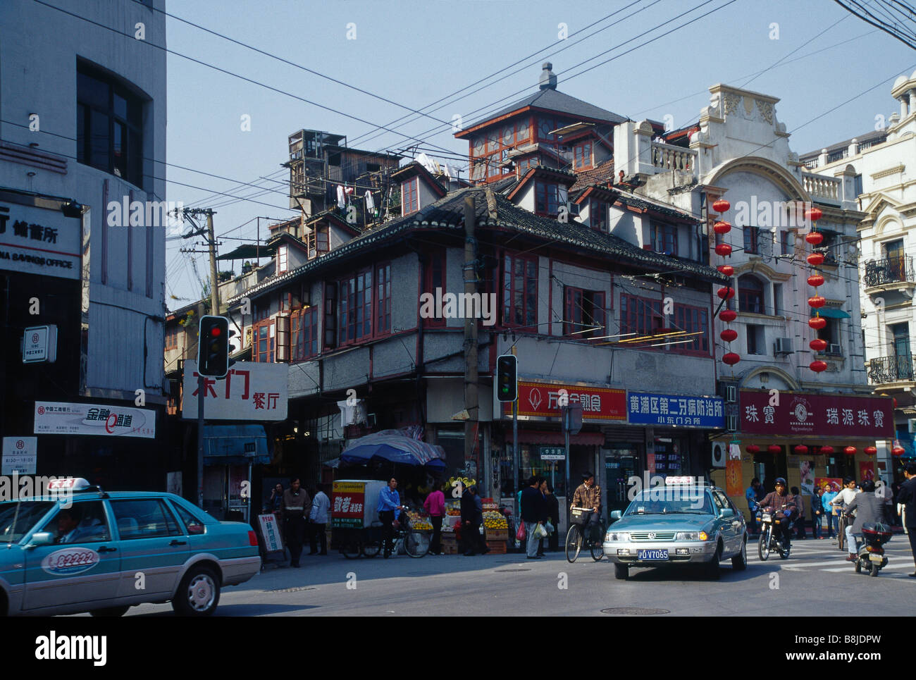 Chinese style houses buildings Street Traffic People SHANGHAI CHINA ...
