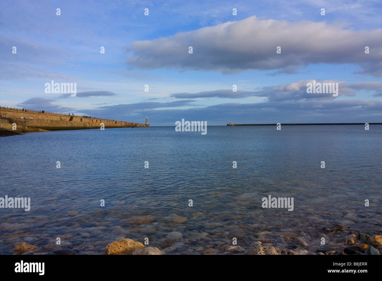 Tynemouth harbour looking East towards lighthouses on both North and ...