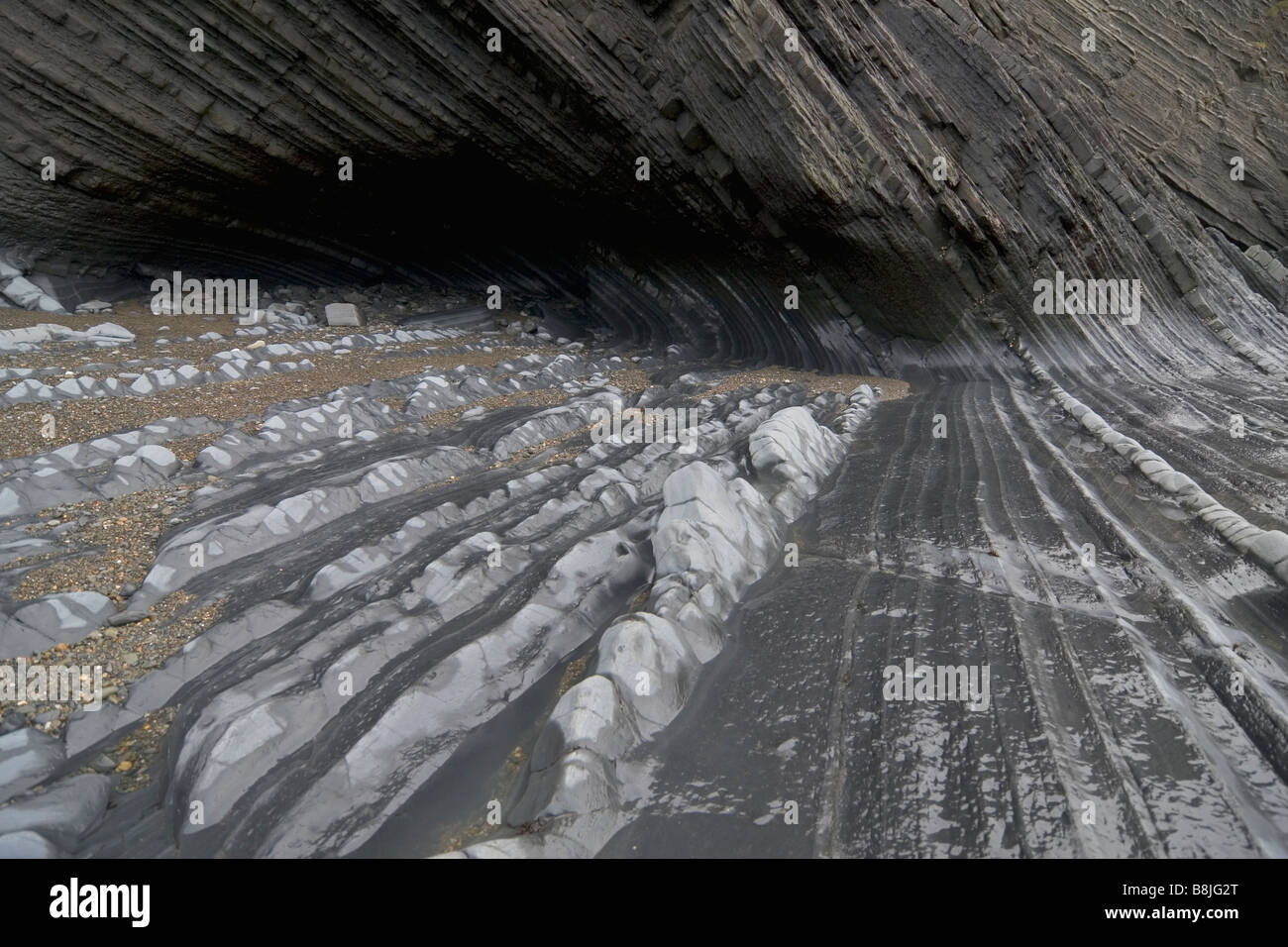 Mudstone on beach between Aberystwyth and Clarach, Wales Stock Photo ...