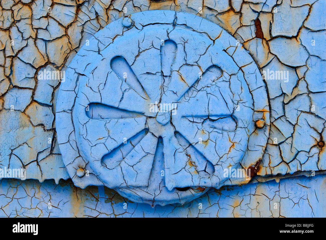 Closeup of blue painted ventilation slit on metal sheet covering with ...