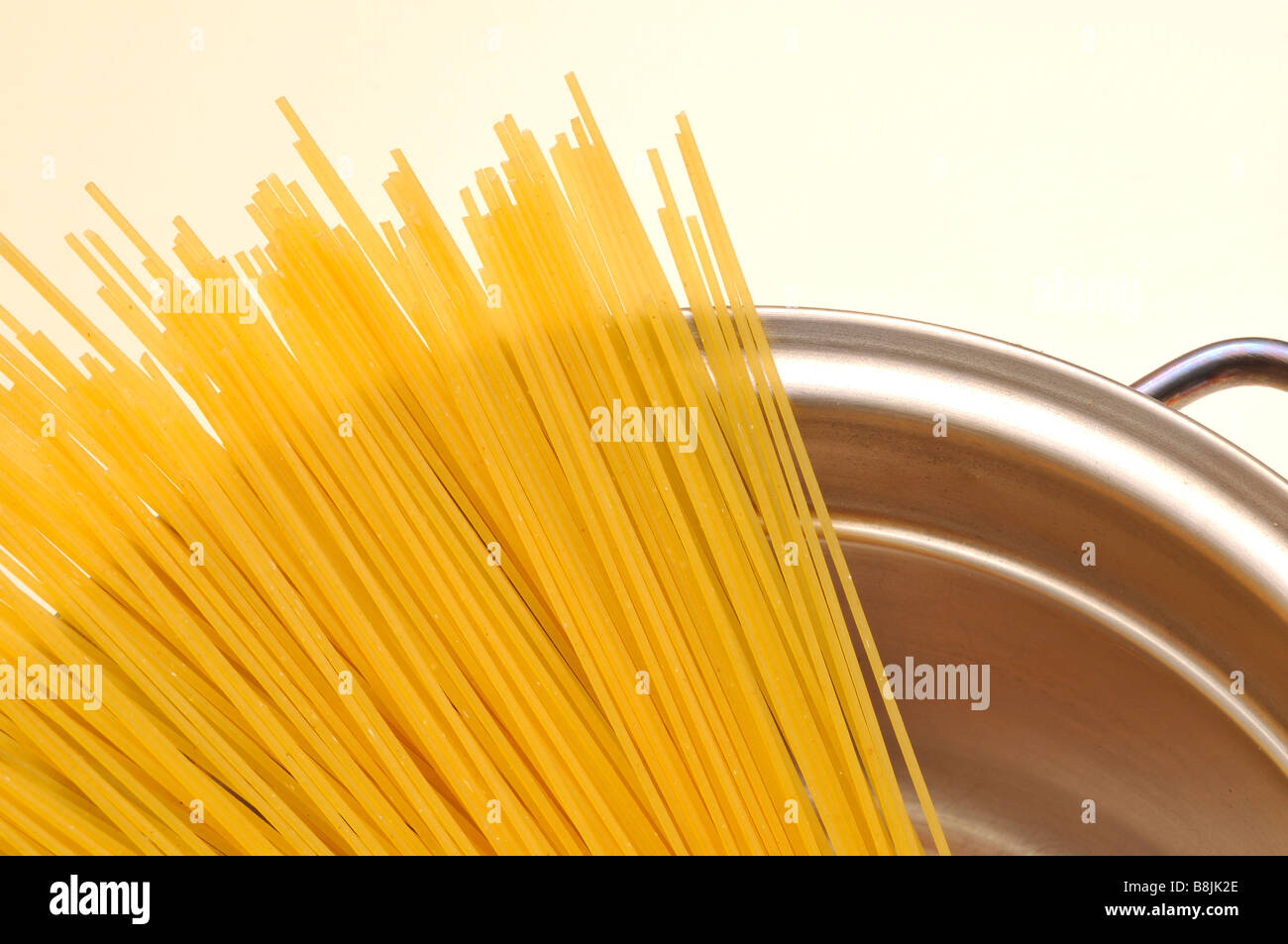 dried spaghetti in stainless steel pan uncooked raw water italian food ...