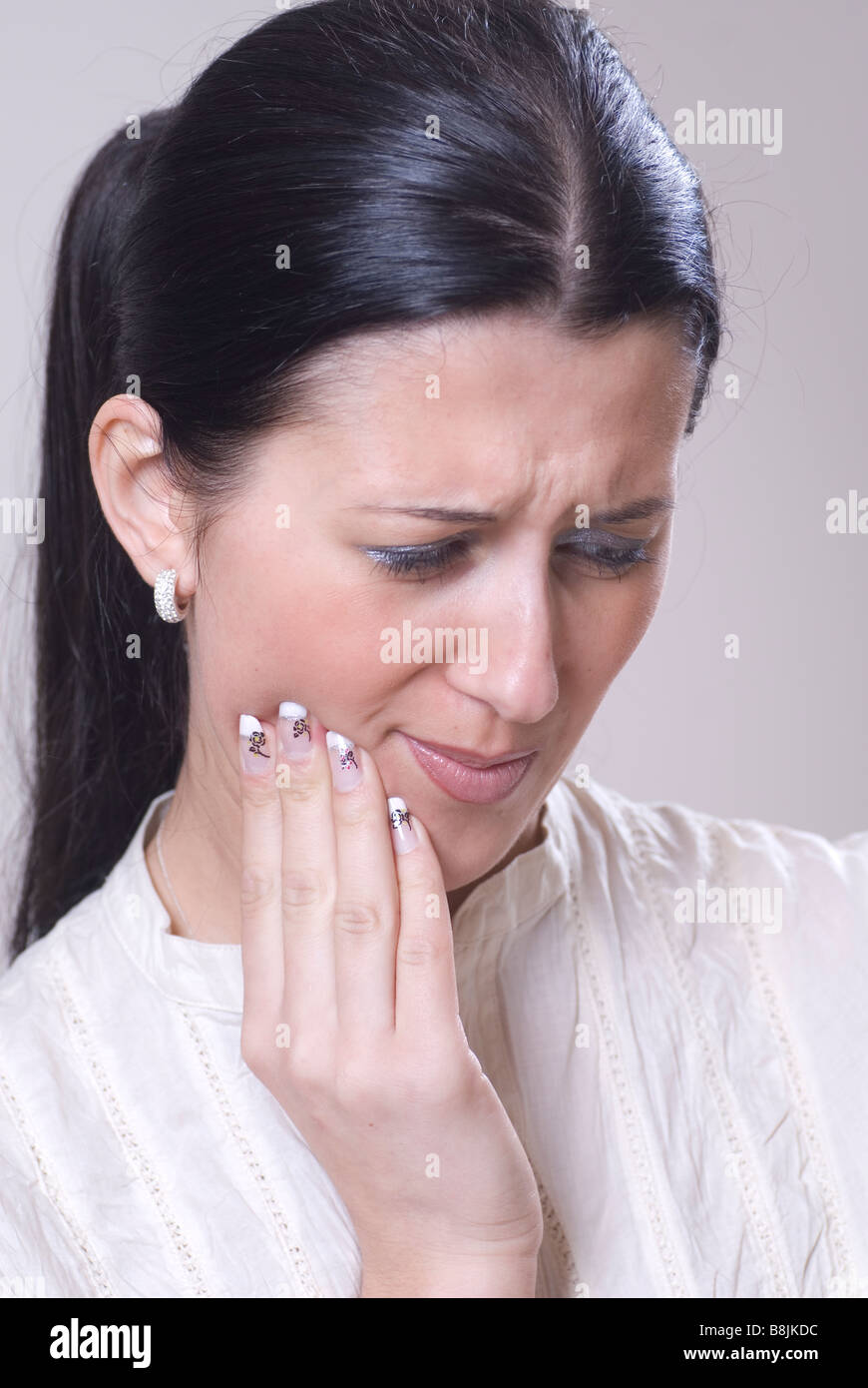 Woman with toothache Stock Photo - Alamy