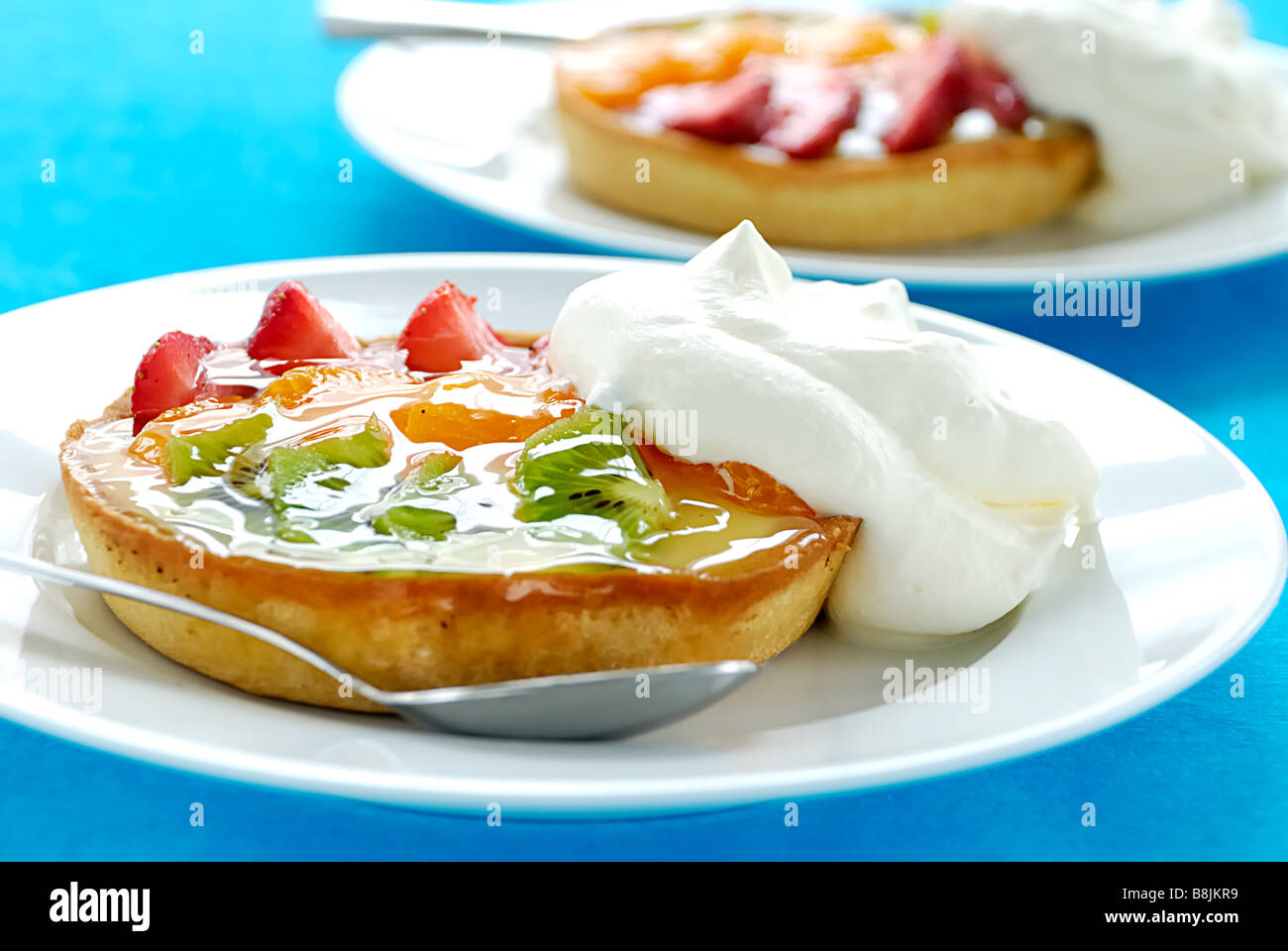 Fruit tart with whipped cream Stock Photo - Alamy