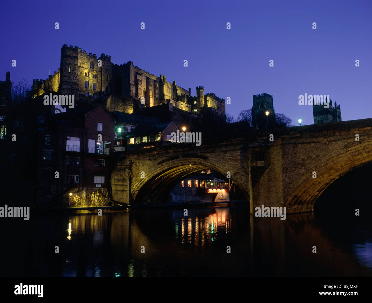 Durham Castle (lit up) seen over River Wear and Framwellgate Bridge ...