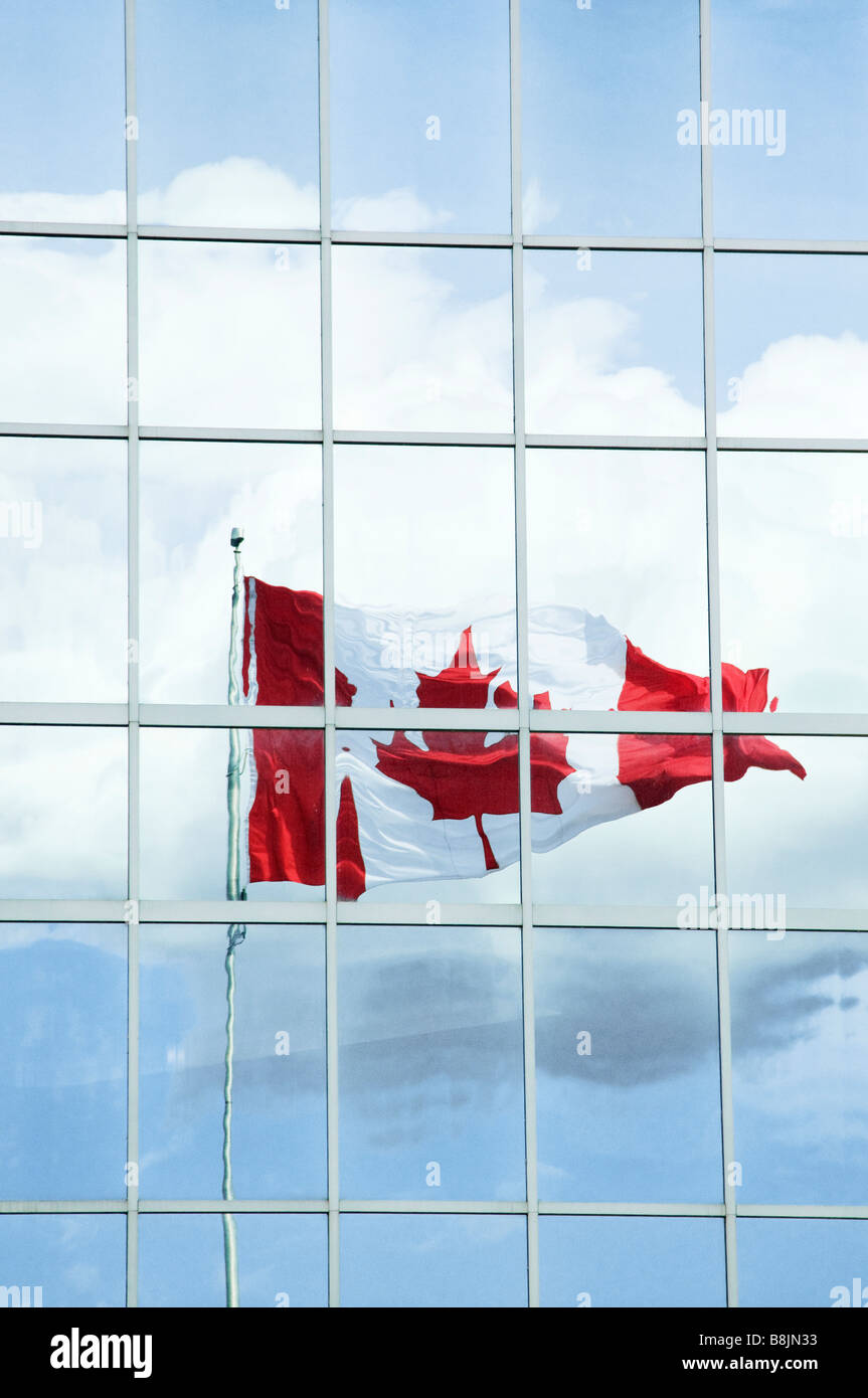 Canadian flag reflected in office windows Stock Photo - Alamy