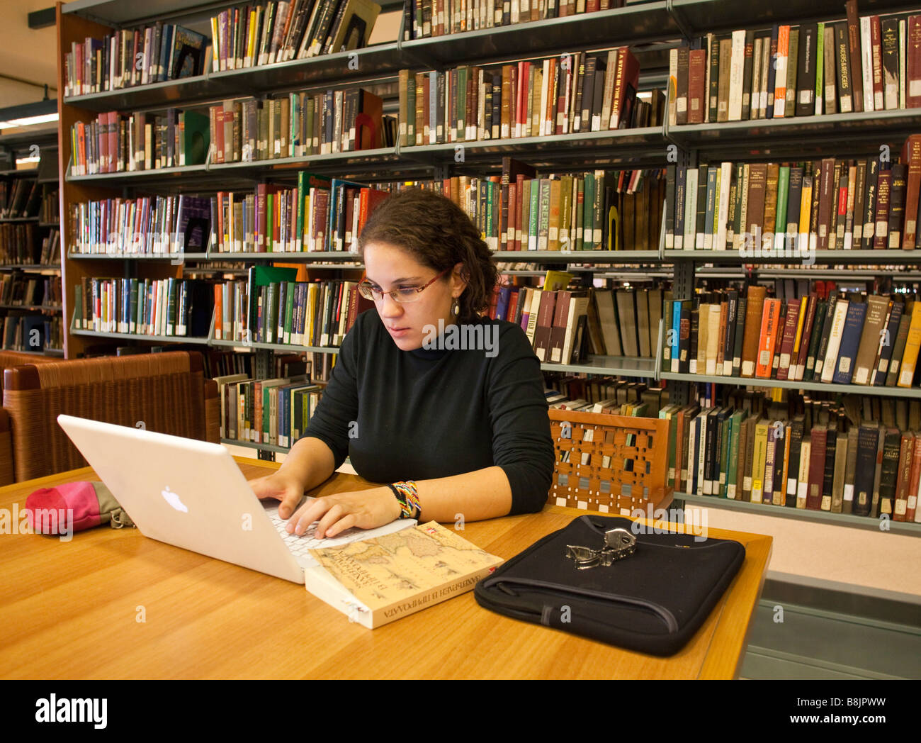 Female books library student hi-res stock photography and images - Alamy