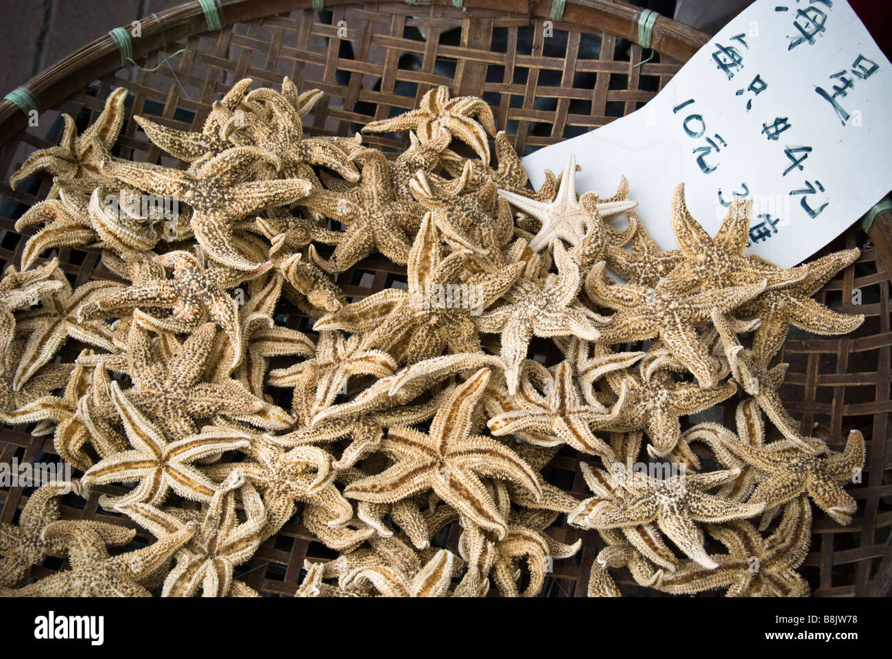 Starfish (sea stars) for sale in a market on one of Hong Kong's ...