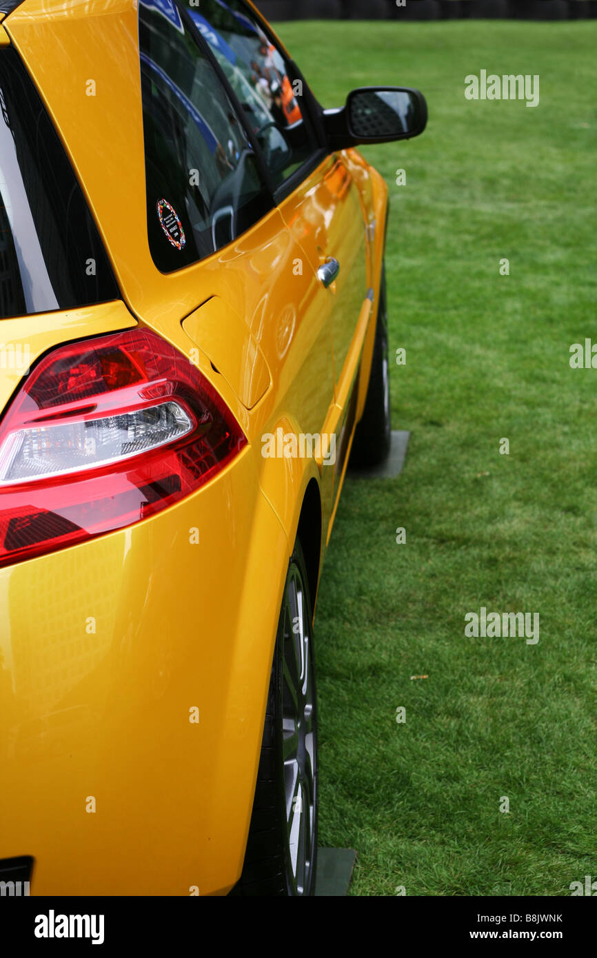 Renault Megane side view over grass Stock Photo - Alamy