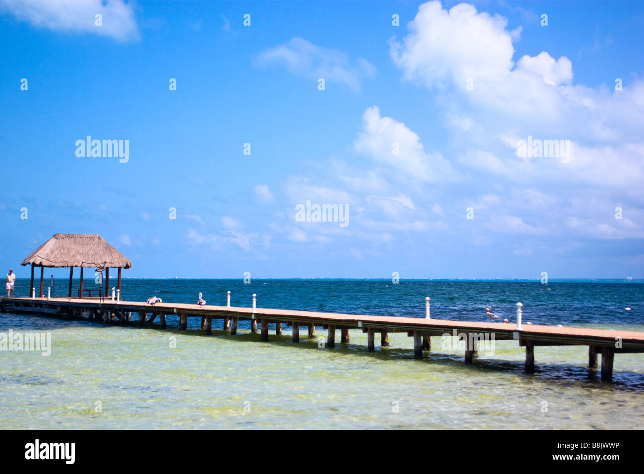 Pier dock in cancun caribbean beach Stock Photo - Alamy