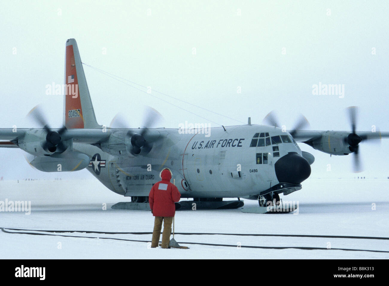 A C-130 Hercules taxis on the snow packed runway of the Ross Ice Shelf ...