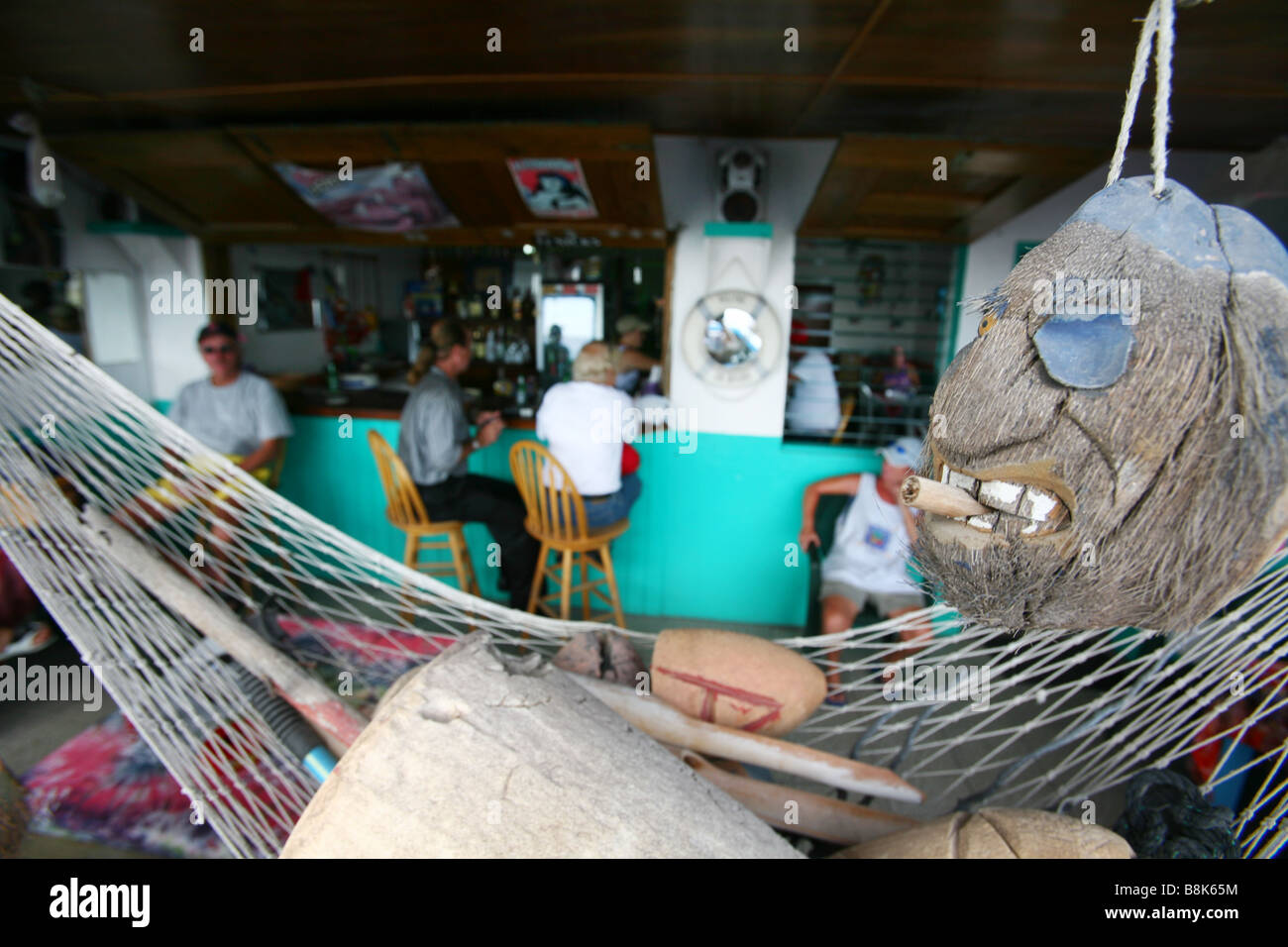 Bar at the harbour of the Dutch island of Saba, a mack-up skull is ...
