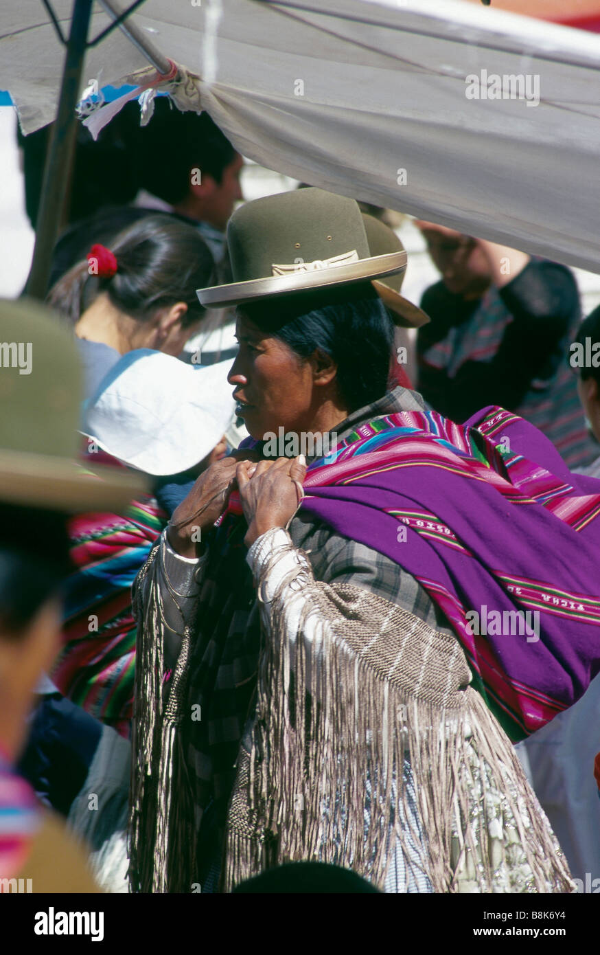Woman in traditional Aymara dress Brown bowler hat felt hat Striped ...