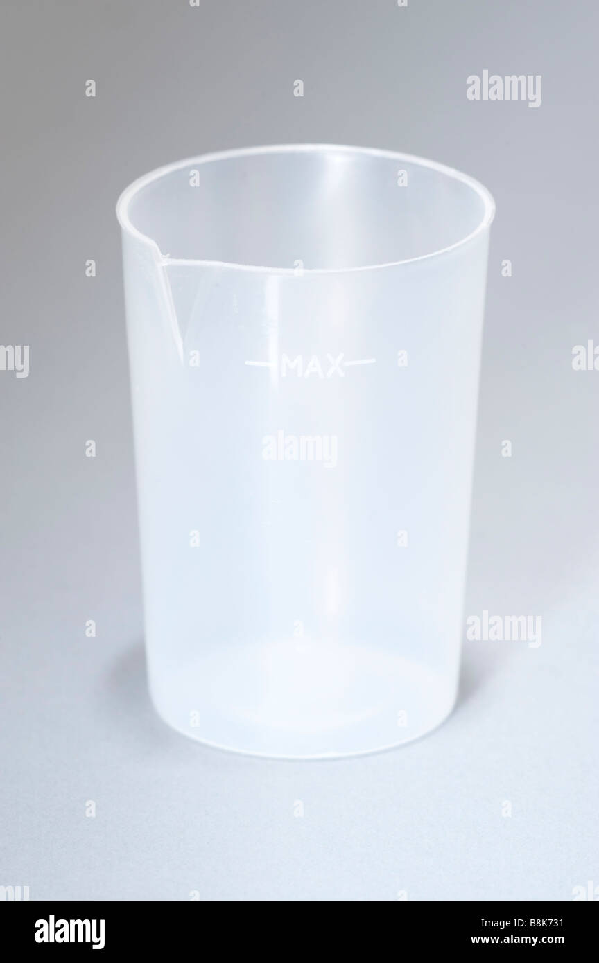 A plastic water measuring container Stock Photo - Alamy