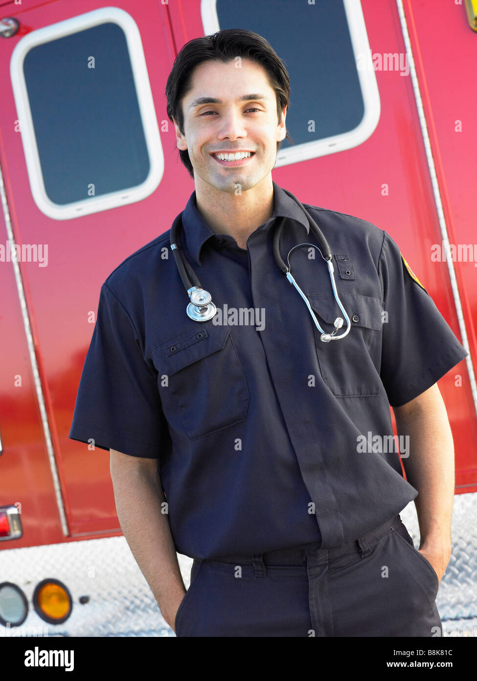 Portrait of paramedic in front of ambulance Stock Photo - Alamy