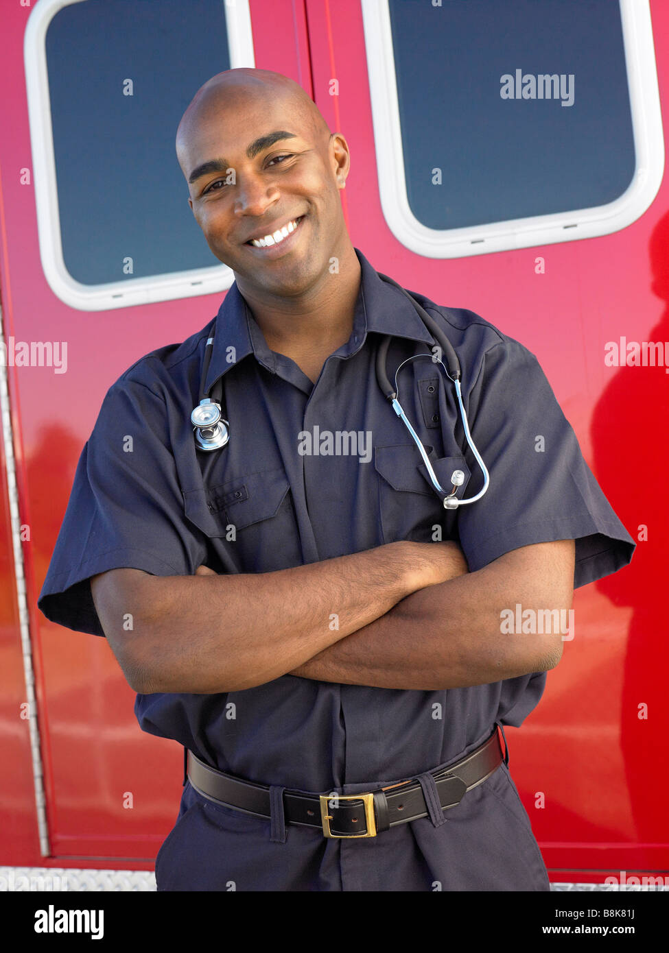 Portrait of paramedic in front of ambulance Stock Photo - Alamy