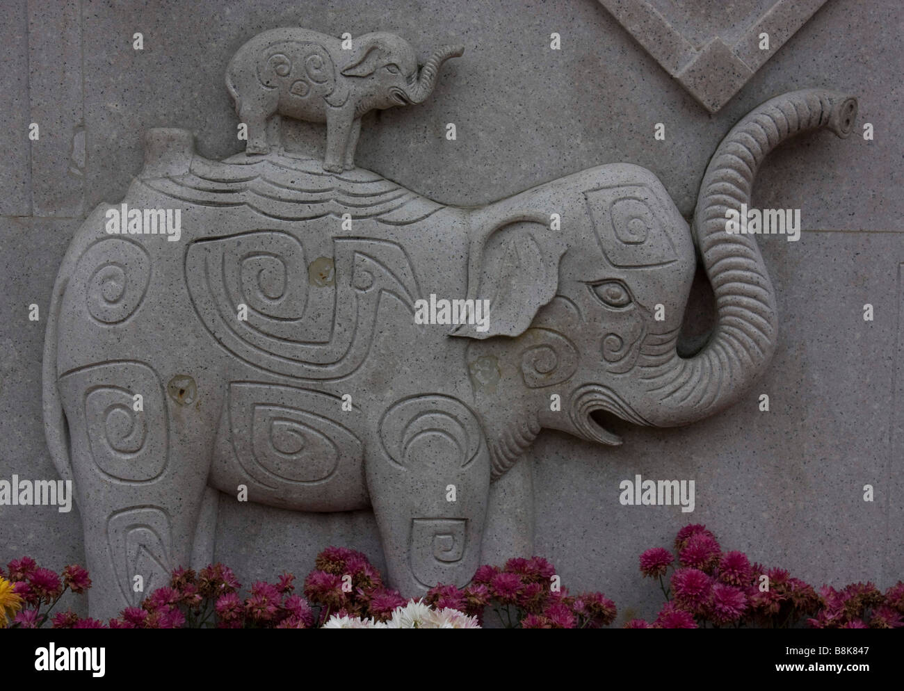 The stone sculpture of a baby elephant on a wall at the Elephant Trunk ...