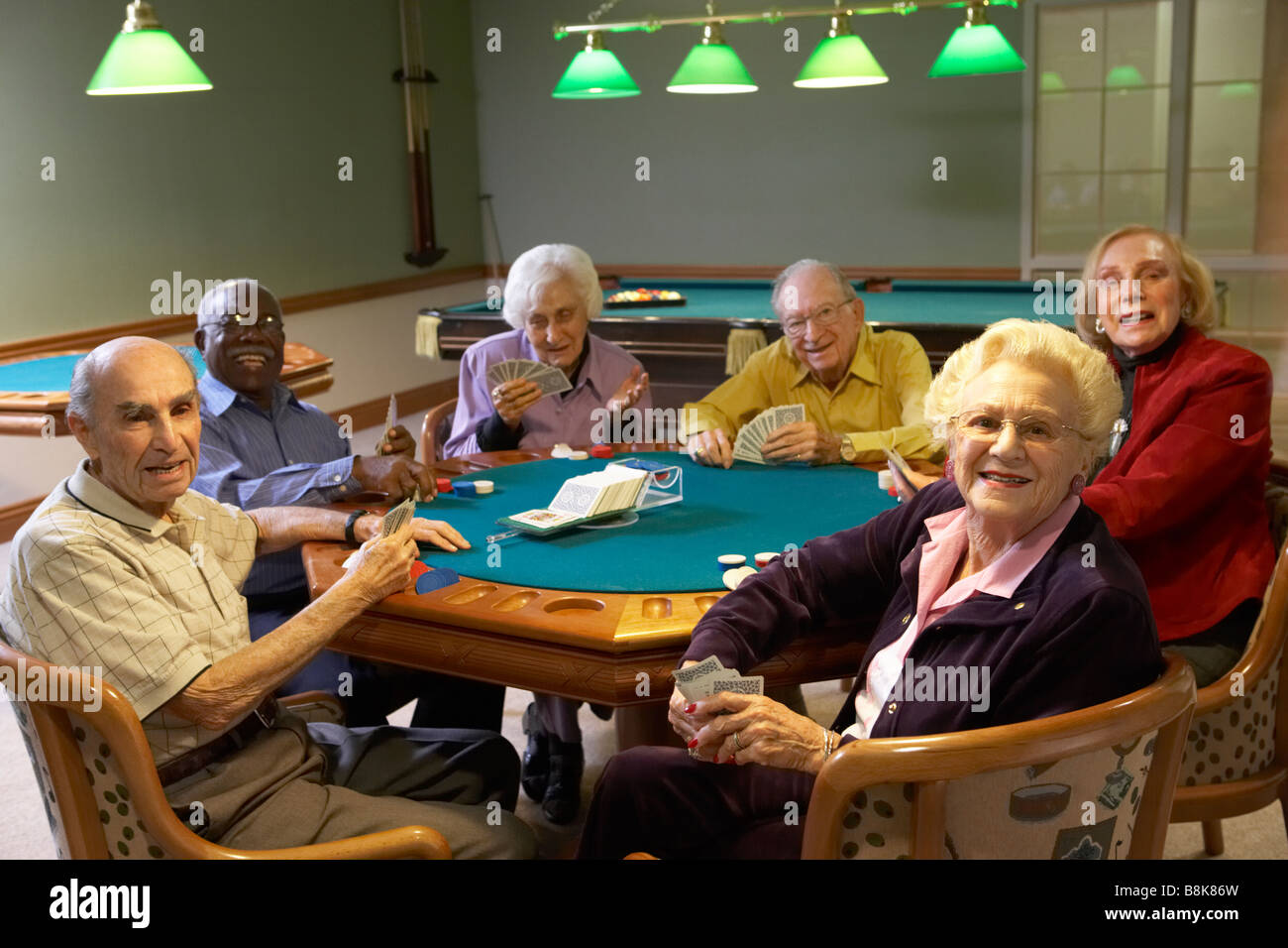 Senior adults playing bridge Stock Photo - Alamy