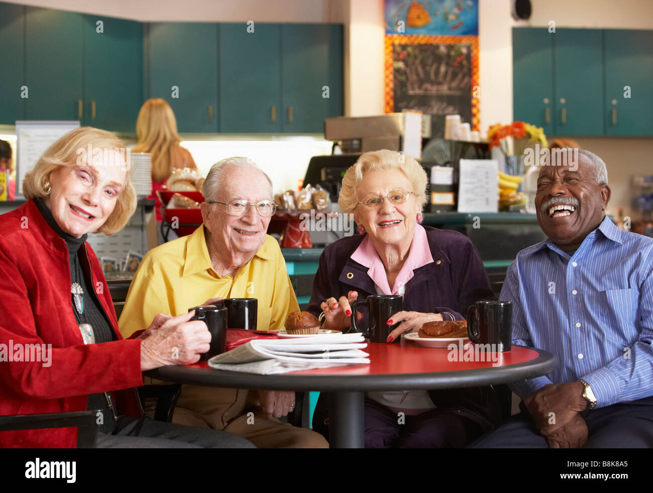 Senior adults having morning tea together Stock Photo - Alamy