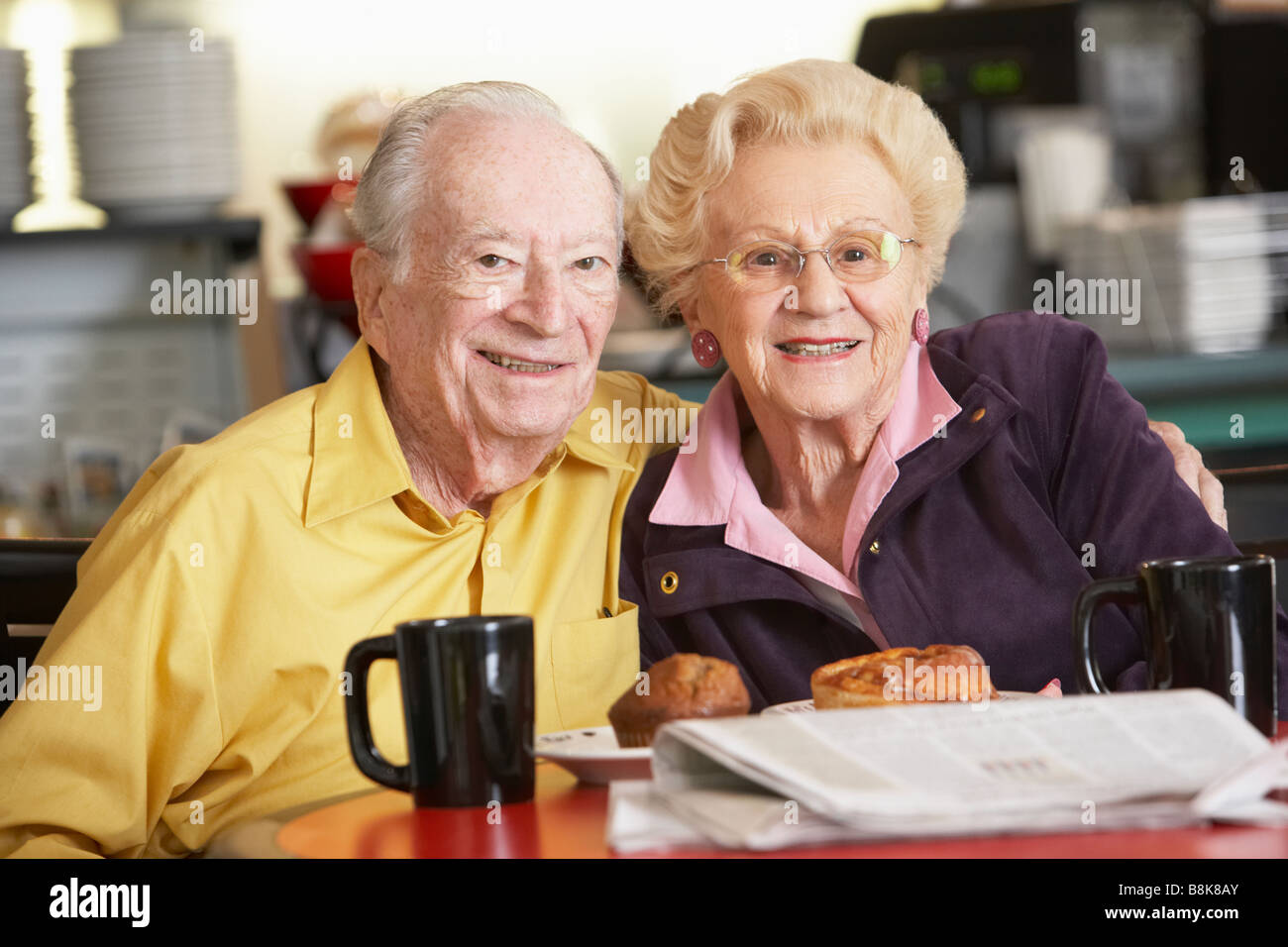 Senior couple having morning tea together Stock Photo - Alamy