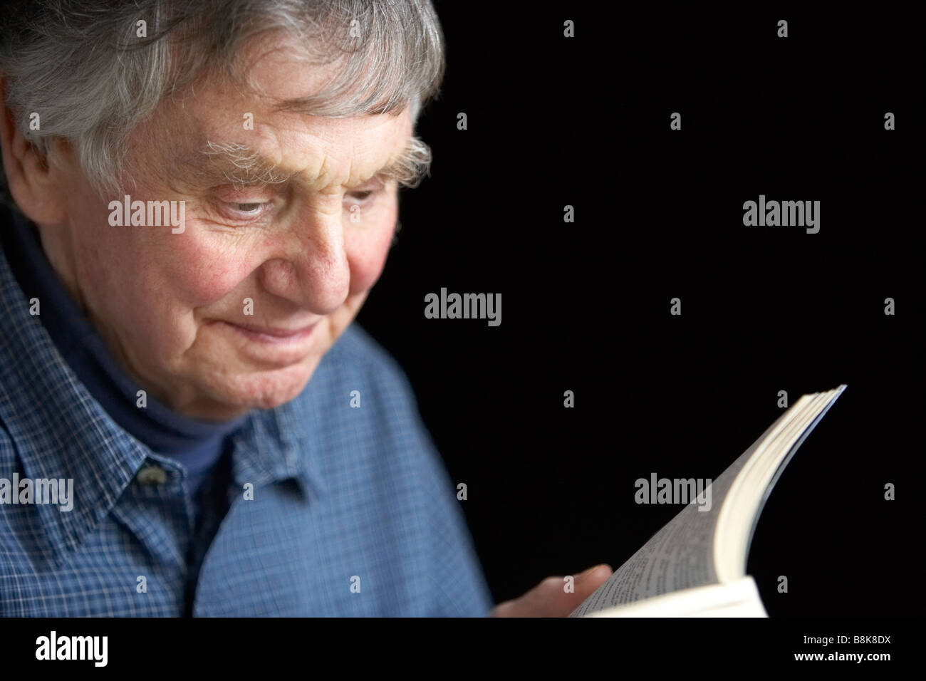 Black old man book hi-res stock photography and images - Alamy