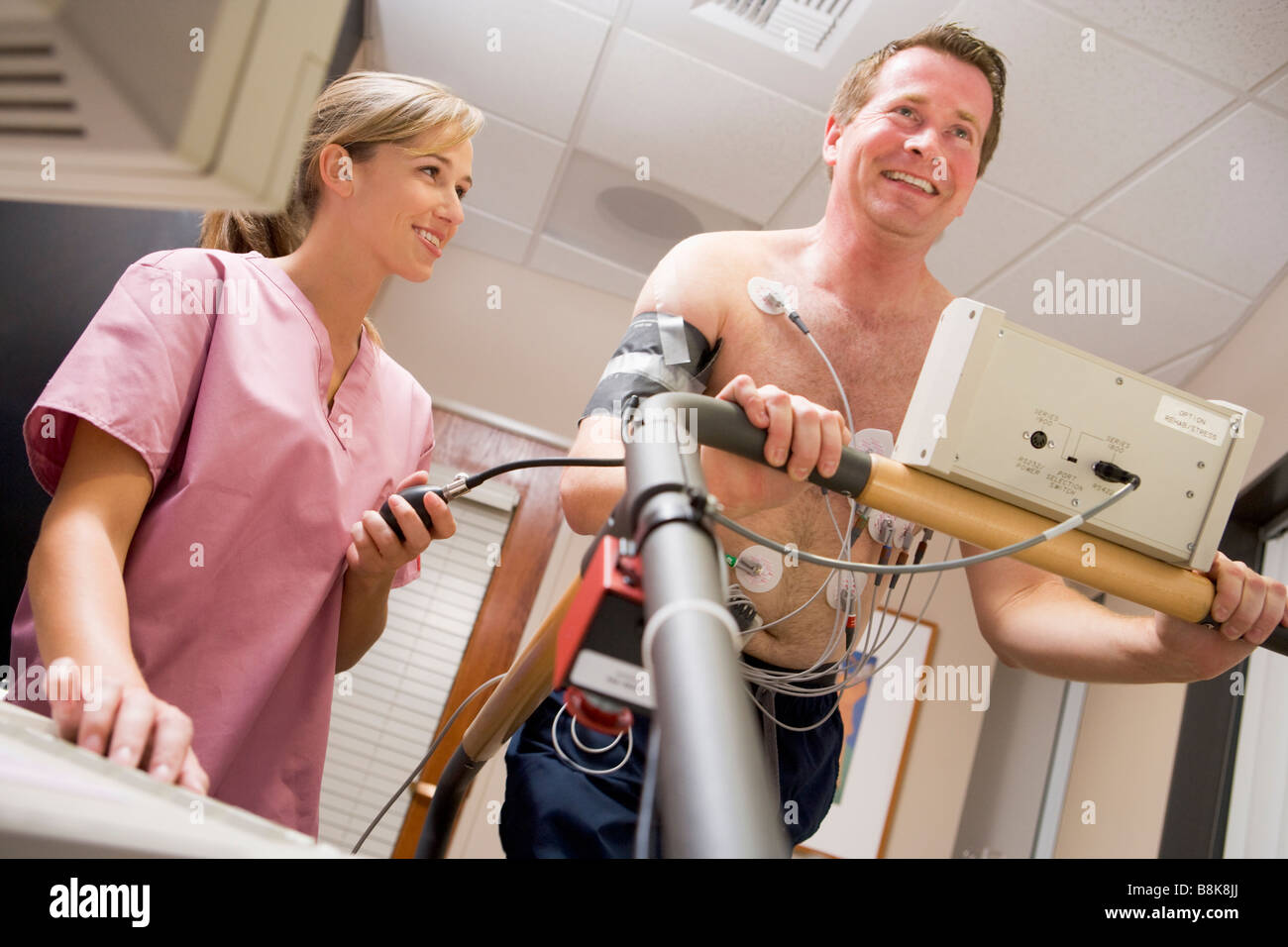 Nurse With Patient During Health Check Stock Photo - Alamy