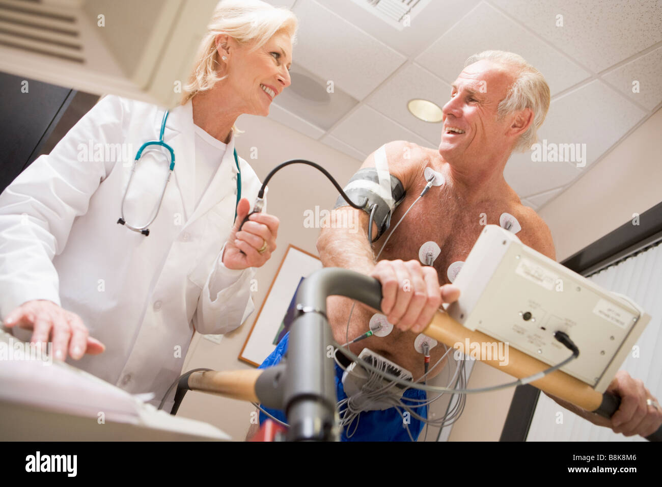 Middle aged woman running treadmill hi-res stock photography and images ...