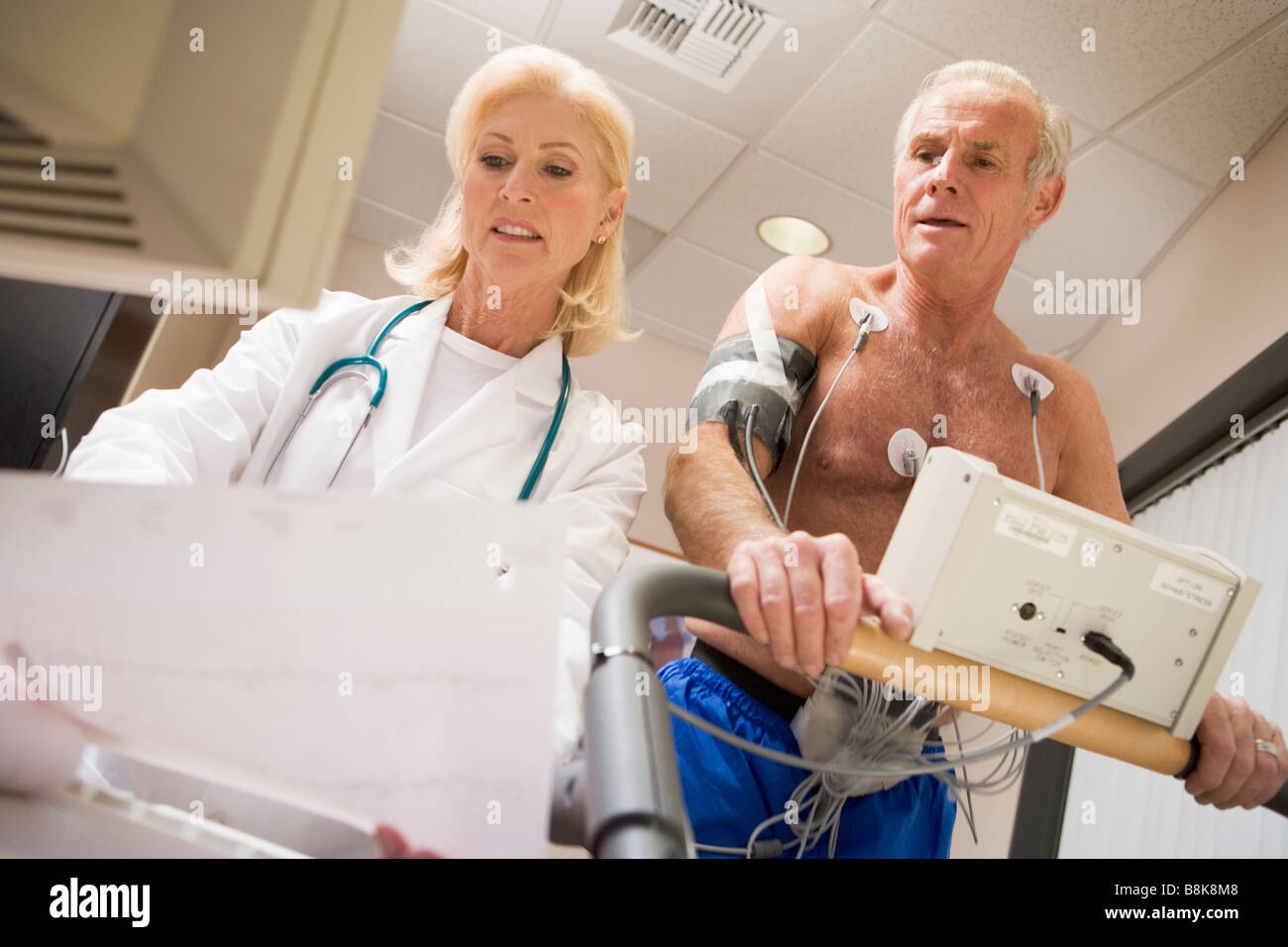 Middle aged woman running treadmill hi-res stock photography and images ...