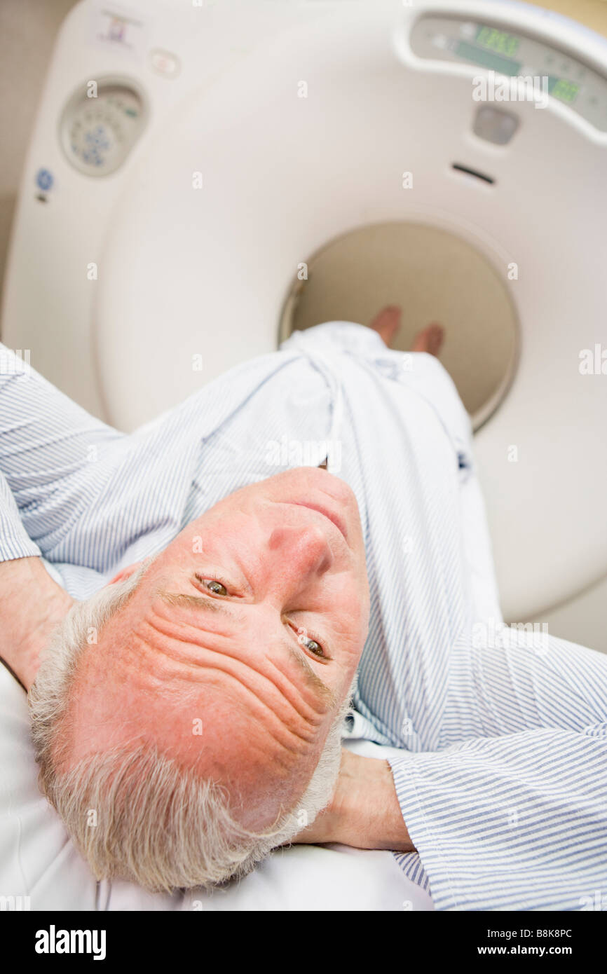 Patient About To Have A Computerized Axial Tomography (CAT) Scan Stock ...