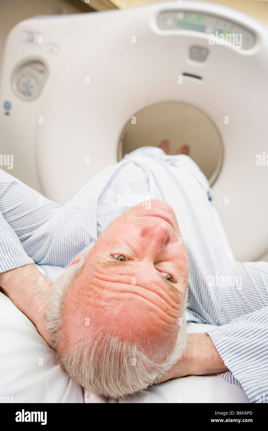 Patient About To Have A Computerized Axial Tomography (CAT) Scan Stock ...