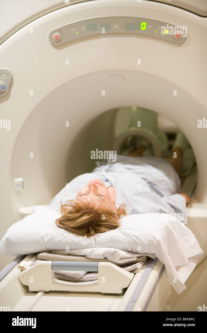 Patient Undergoing For A Computerized Axial Tomography (CAT) Scan Stock ...