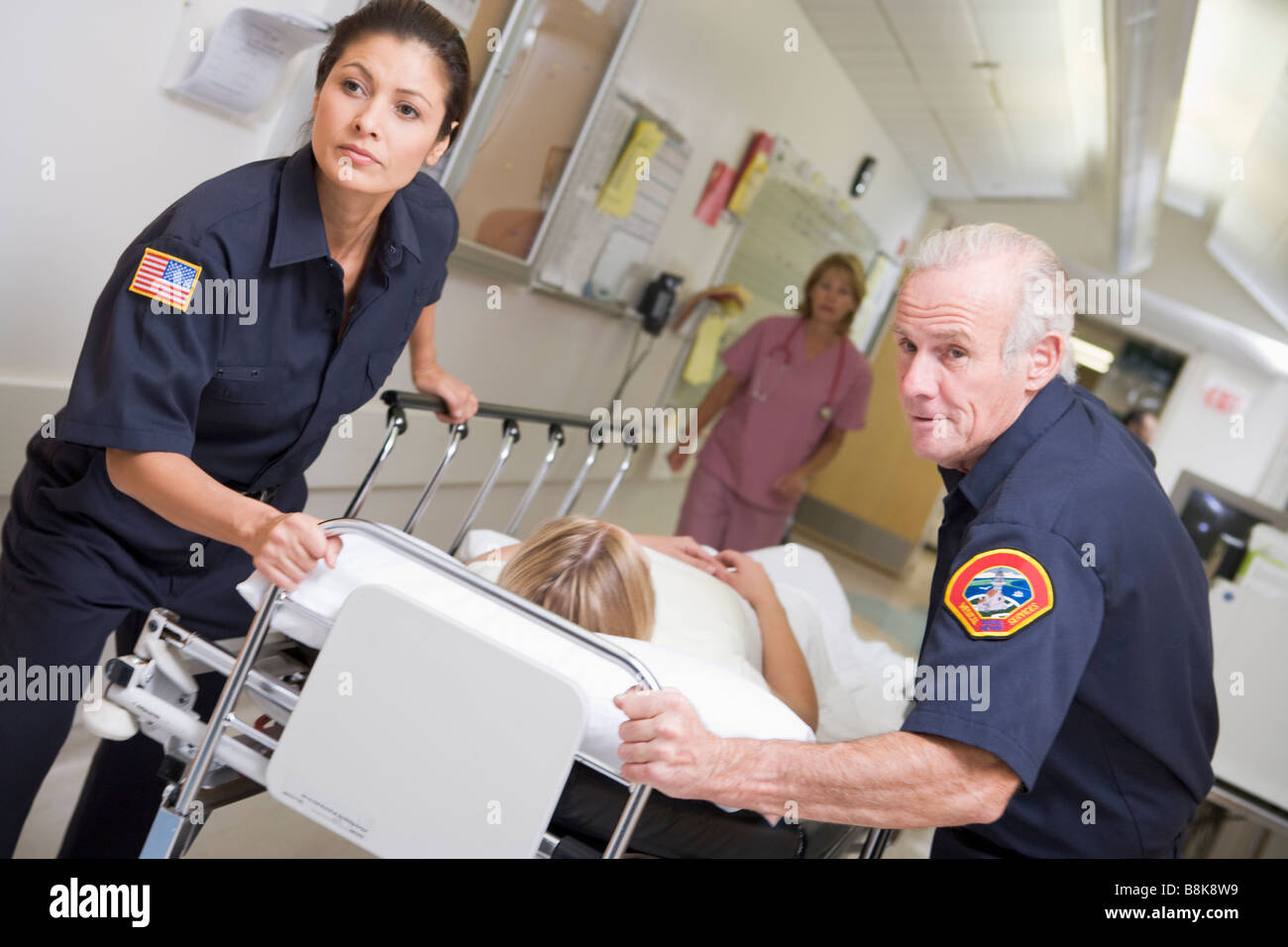 Paramedics Rushing Emergency Patient Into Hospital Stock Photo - Alamy