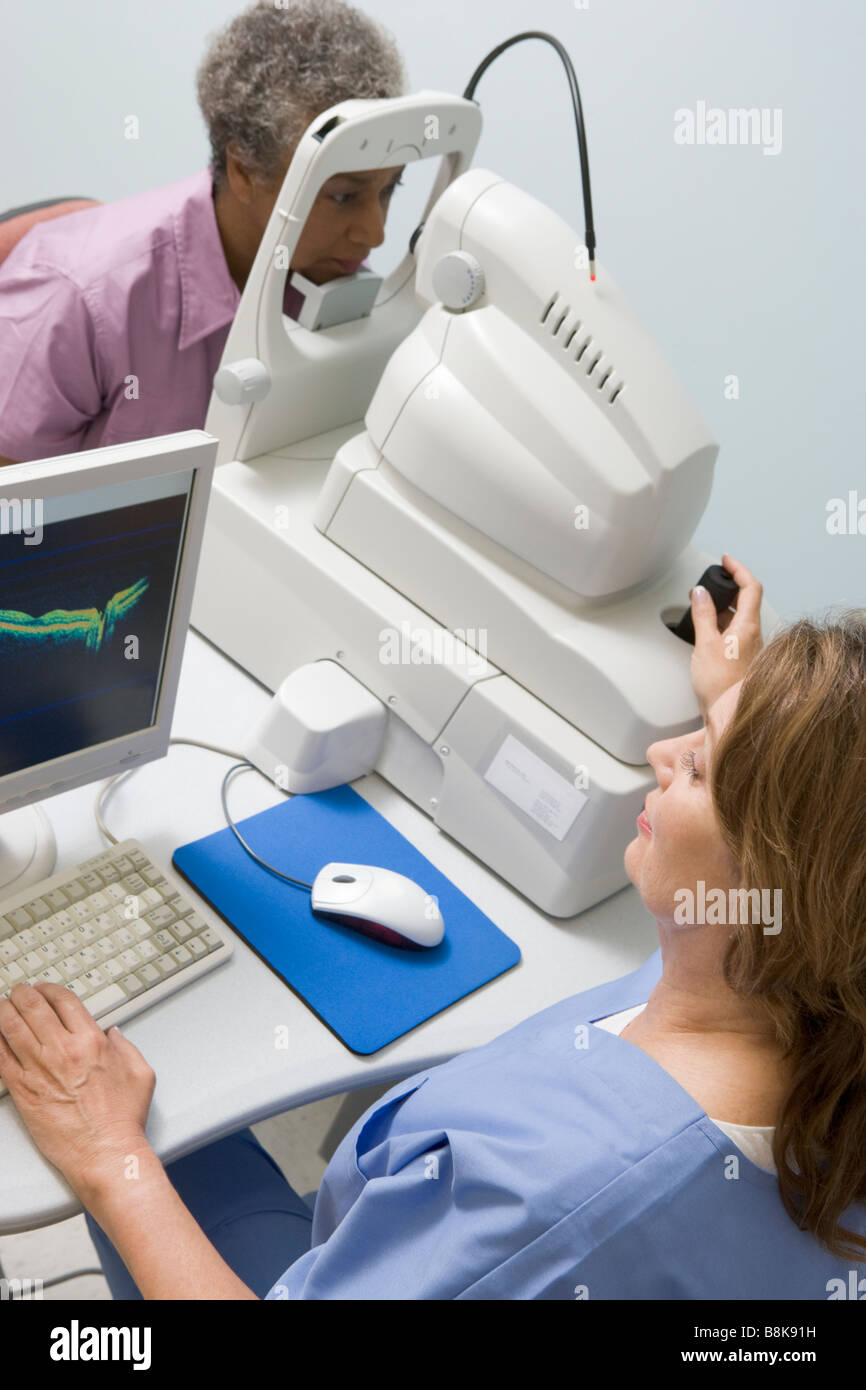 Nurse Checking Patient's Eyes Stock Photo - Alamy