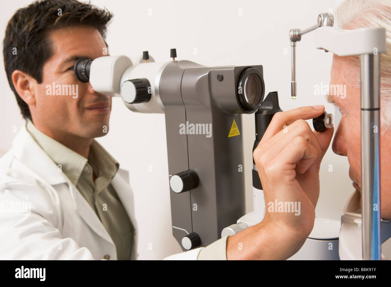 Doctor Checking Patient's Eyes Stock Photo - Alamy