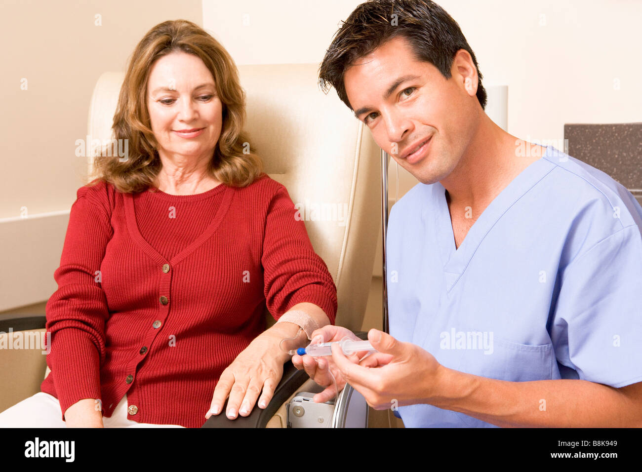 Nurse Giving Patient An Injection Stock Photo - Alamy