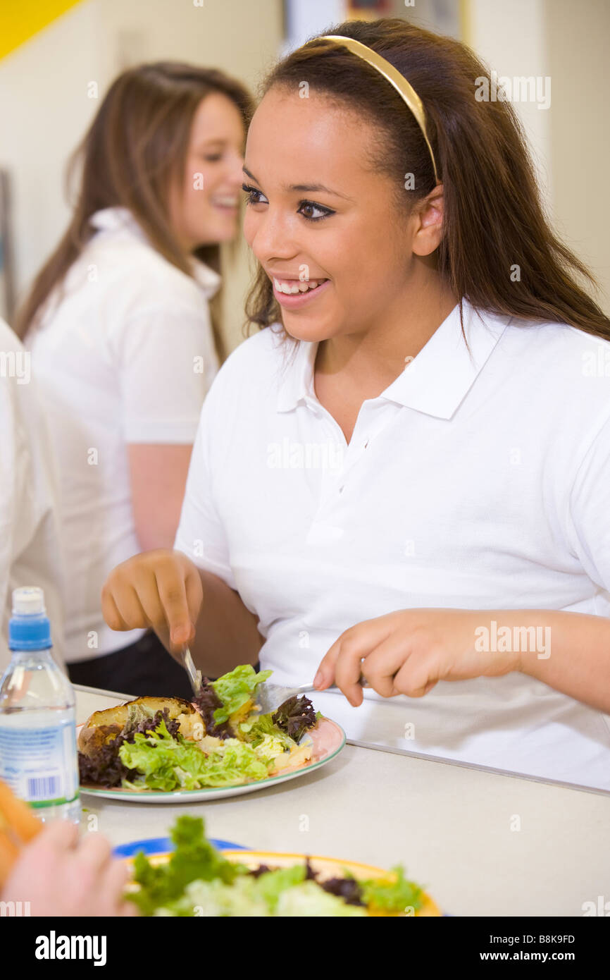 Student having lunch in dining hall Stock Photo - Alamy
