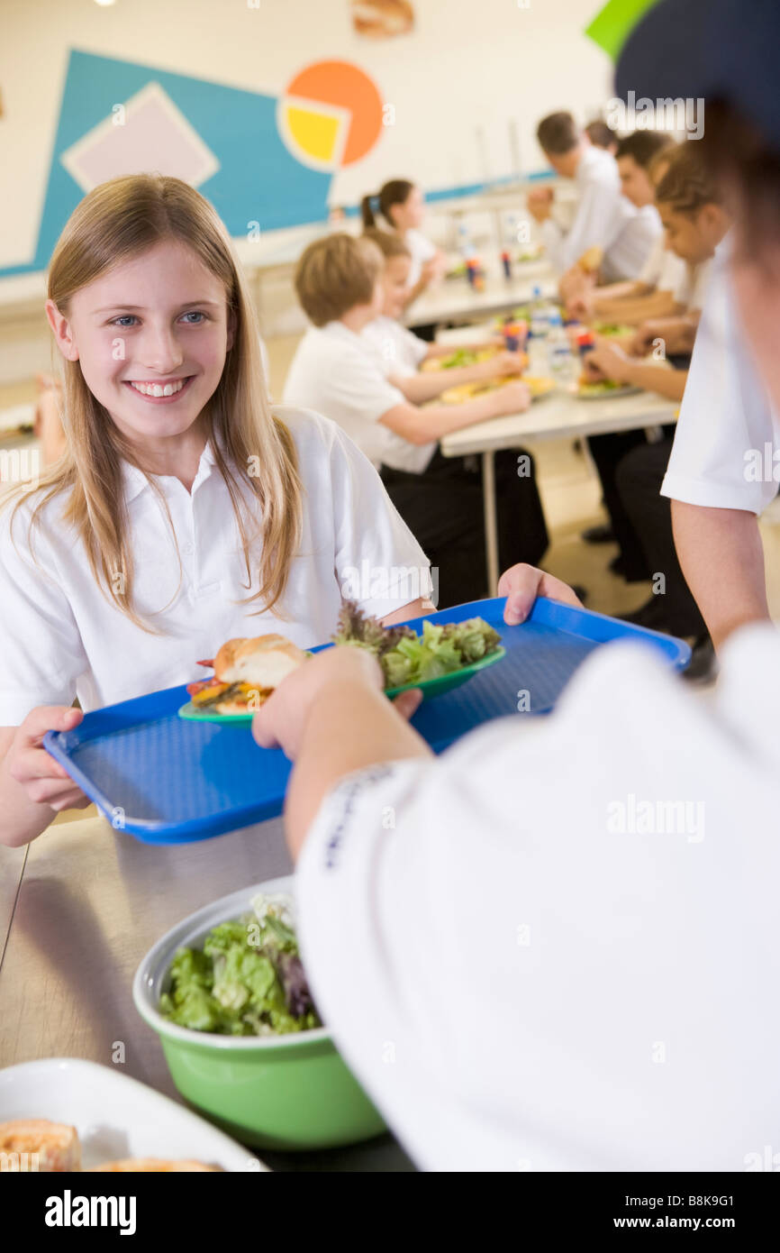 Student having lunch in dining hall Stock Photo - Alamy
