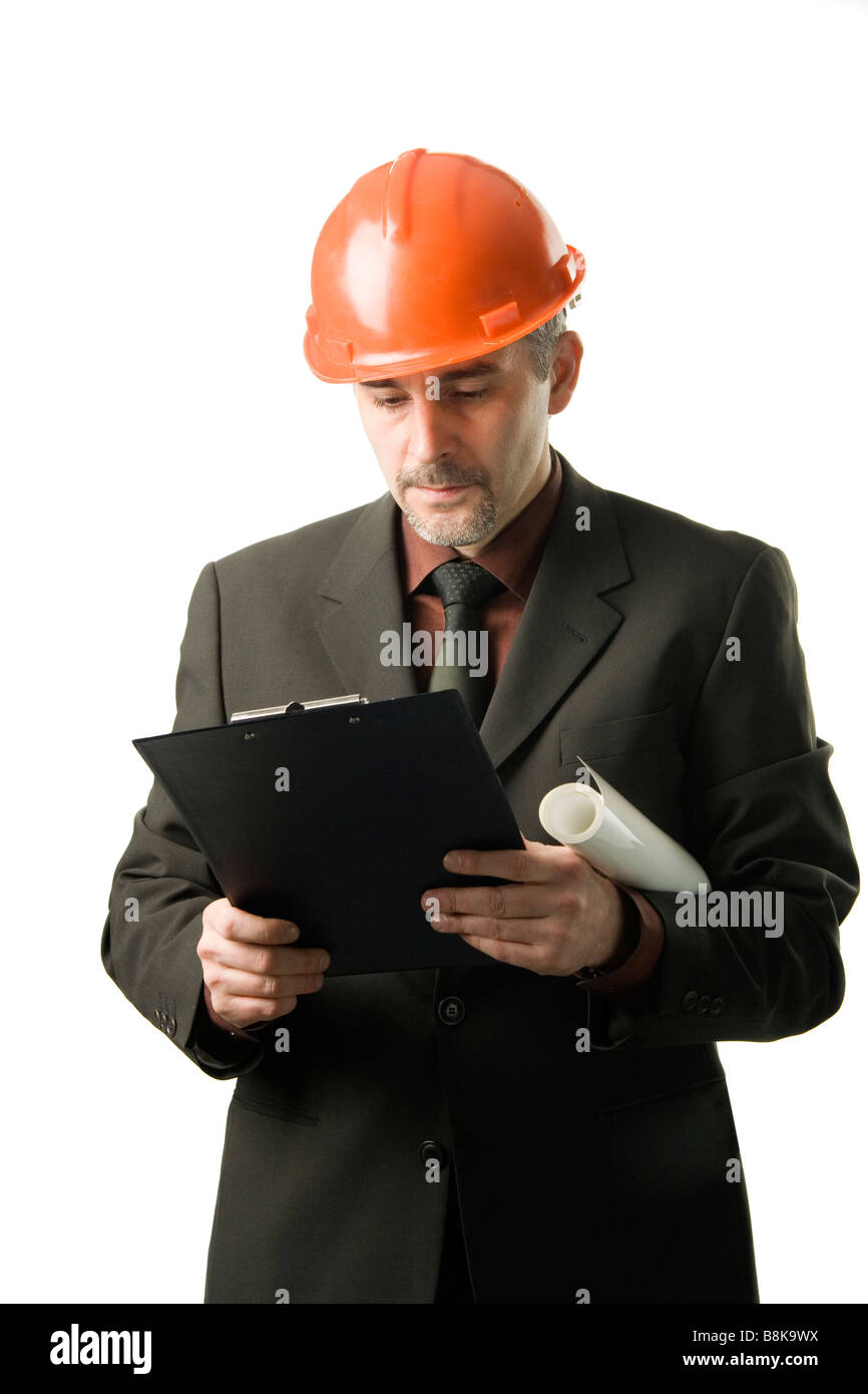 Male architect reading documents construction hi-res stock photography ...