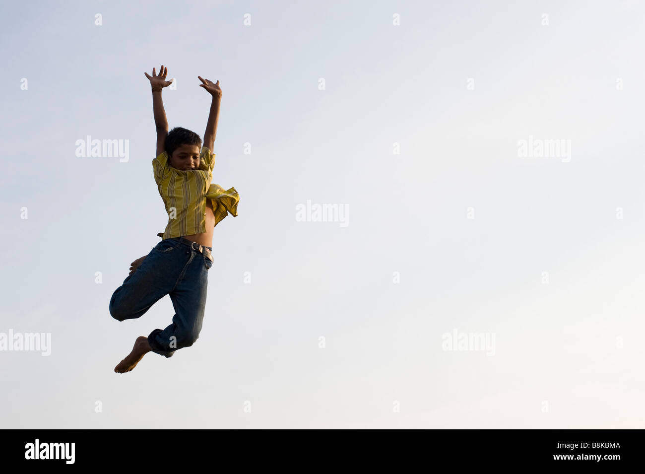 Young Indian boy jumping and leaping in the air. India Stock Photo - Alamy