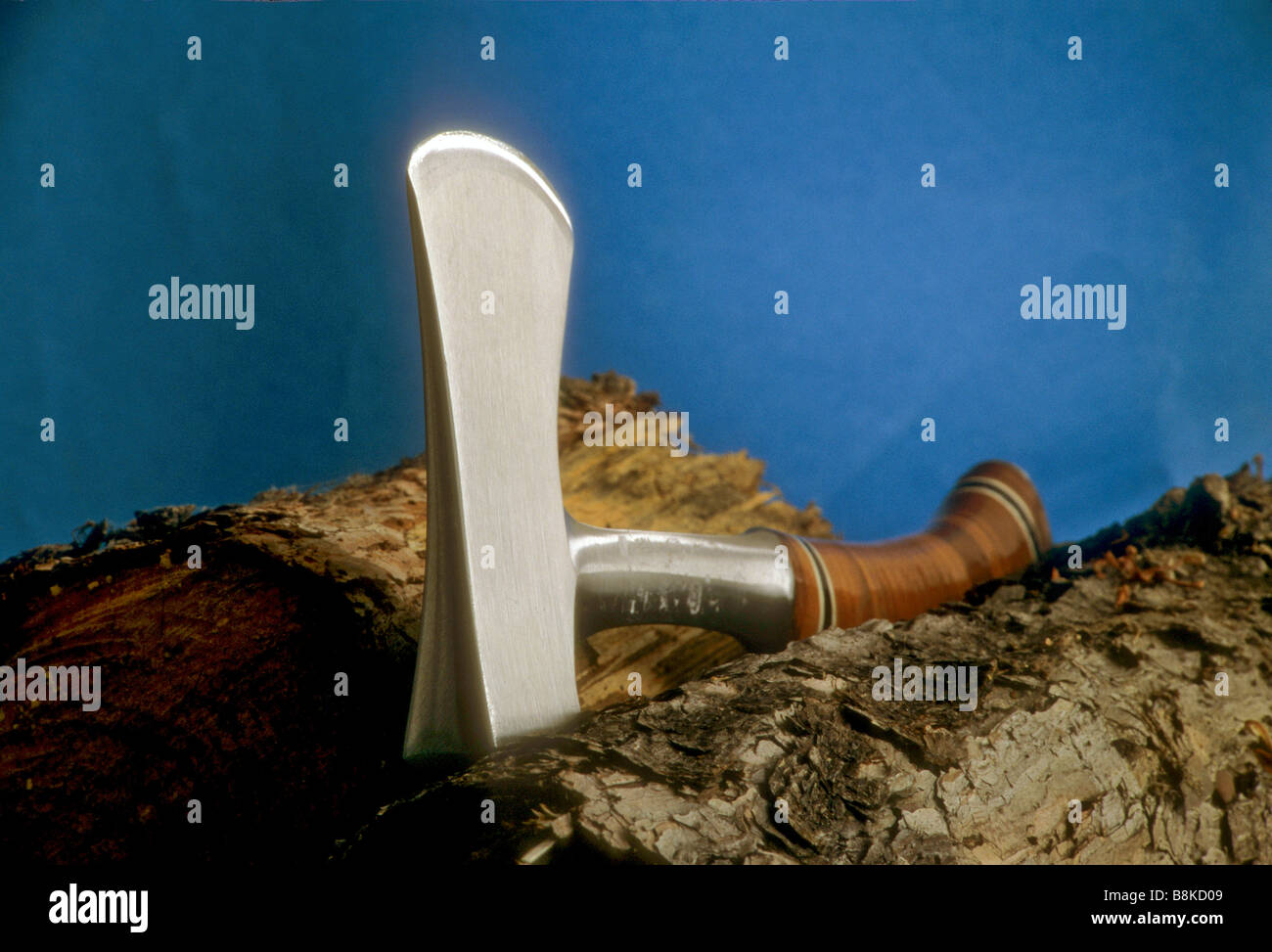 hatchet axe sharp blade up wood log cut chop danger care caution injury ...