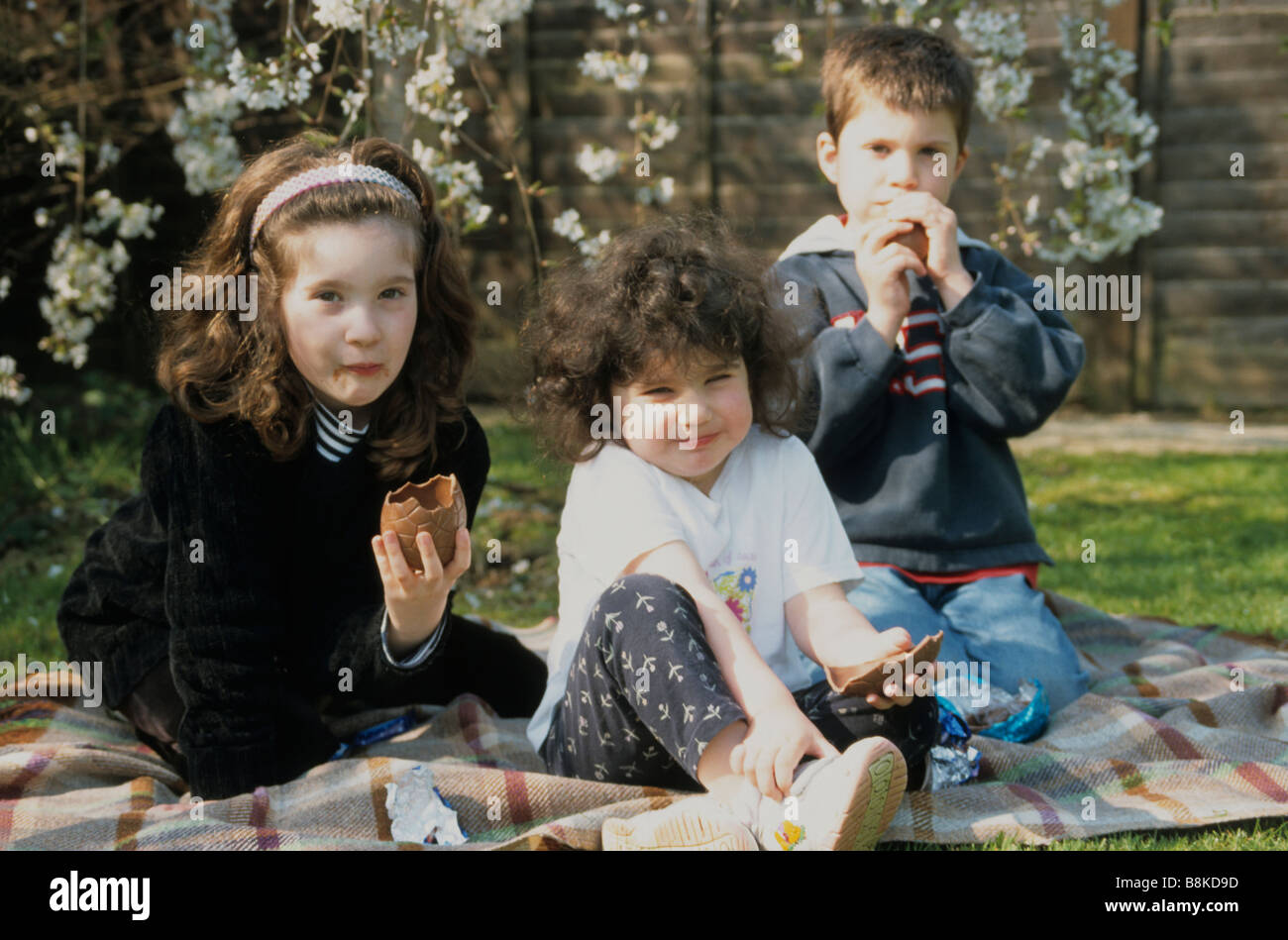 children eating easter eggs Stock Photo - Alamy