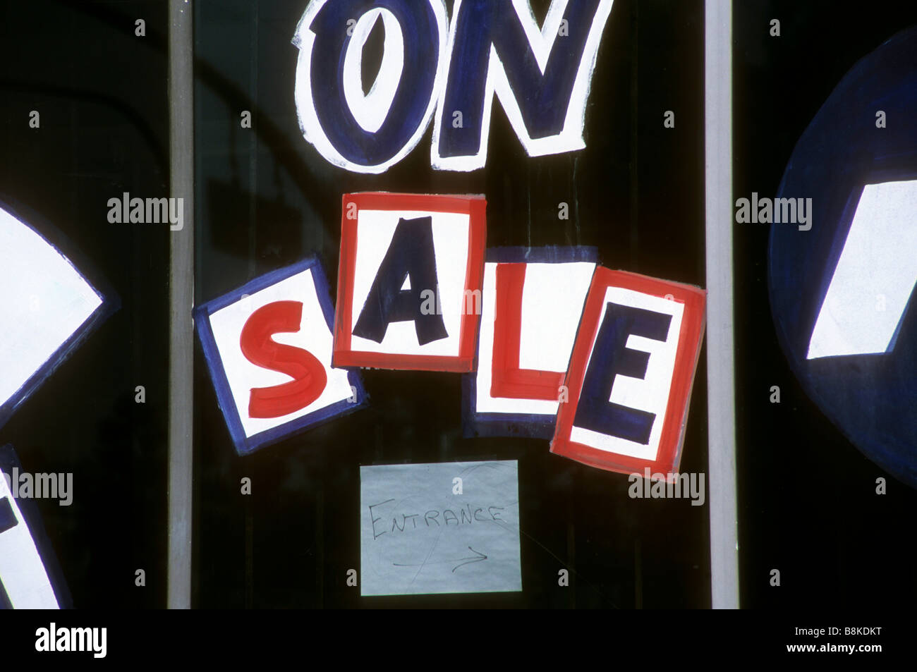 on sale sign window business store shop Stock Photo - Alamy