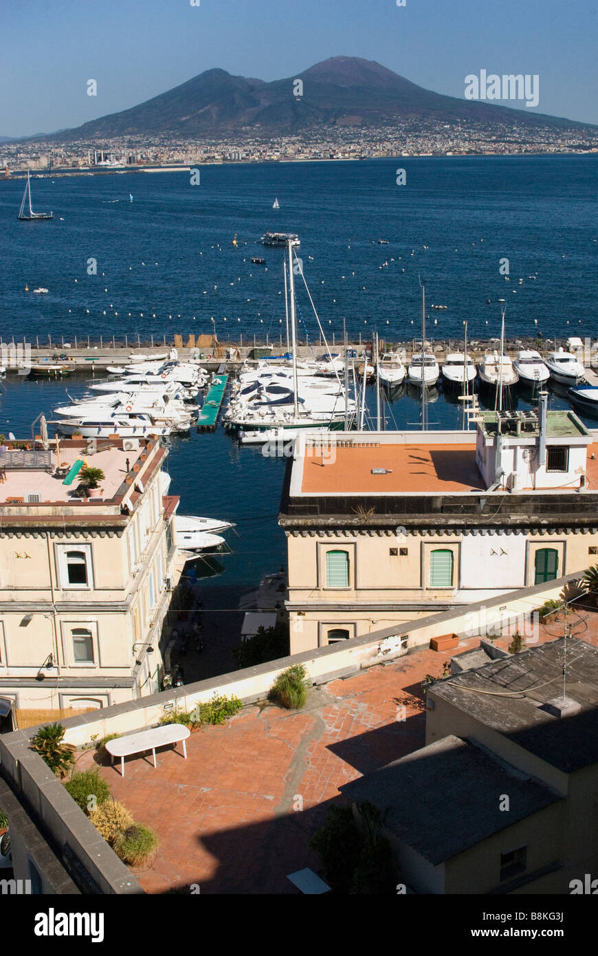 Mount Vesuvius seen from Naples harbour Stock Photo - Alamy