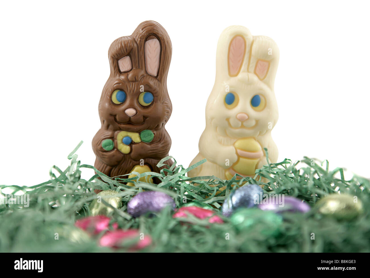 Milk chocolate and white chocolate Easter bunnies in love running ...