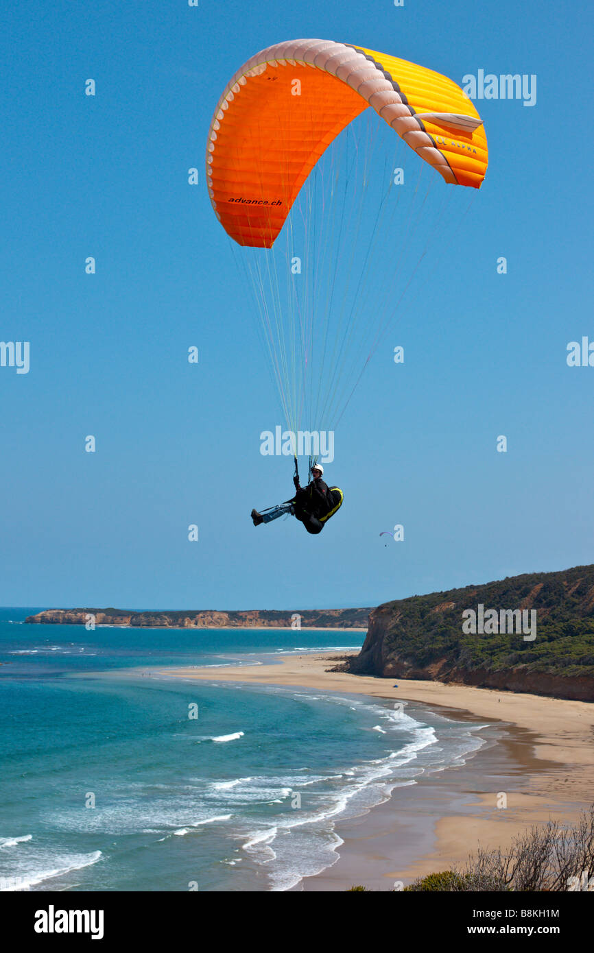 A Paraglider gliding over the Famous Cliffs of Bells beach Torquay ...
