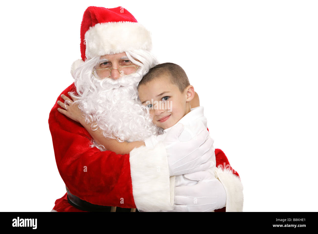 Santa clause and a child at christmas Stock Photo - Alamy