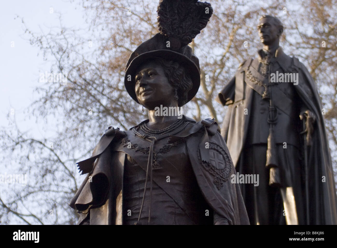 Statue of Queen Elizabeth, The Queen Mother stands in front of her ...